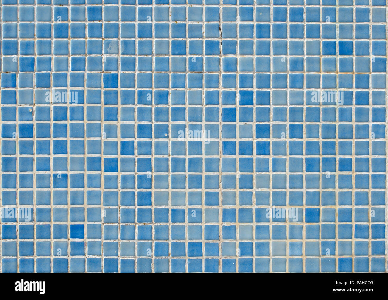 Blue tile pattern in swimming pool Stock Photo - Alamy
