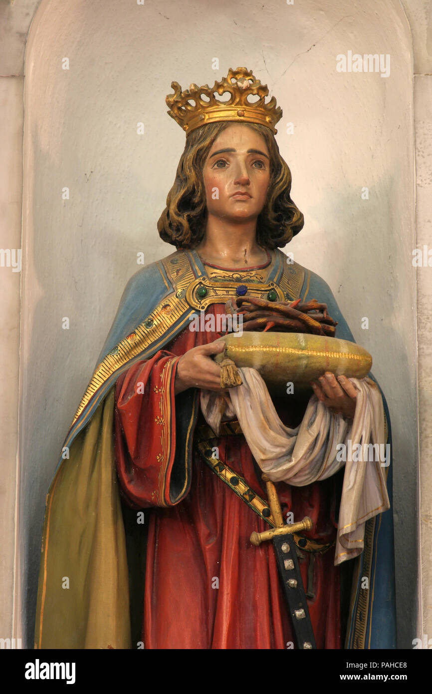 Saint Louis with crown of thorns, statue on the altar of Saint Francis ...