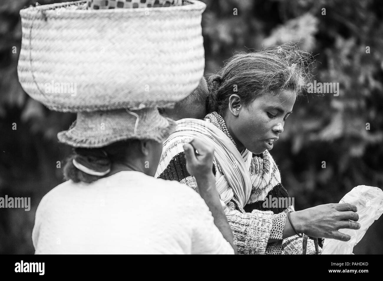 ANTANANARIVO, MADAGASCAR - JUNE 30, 2011: Unidentified Madagascar girl ...