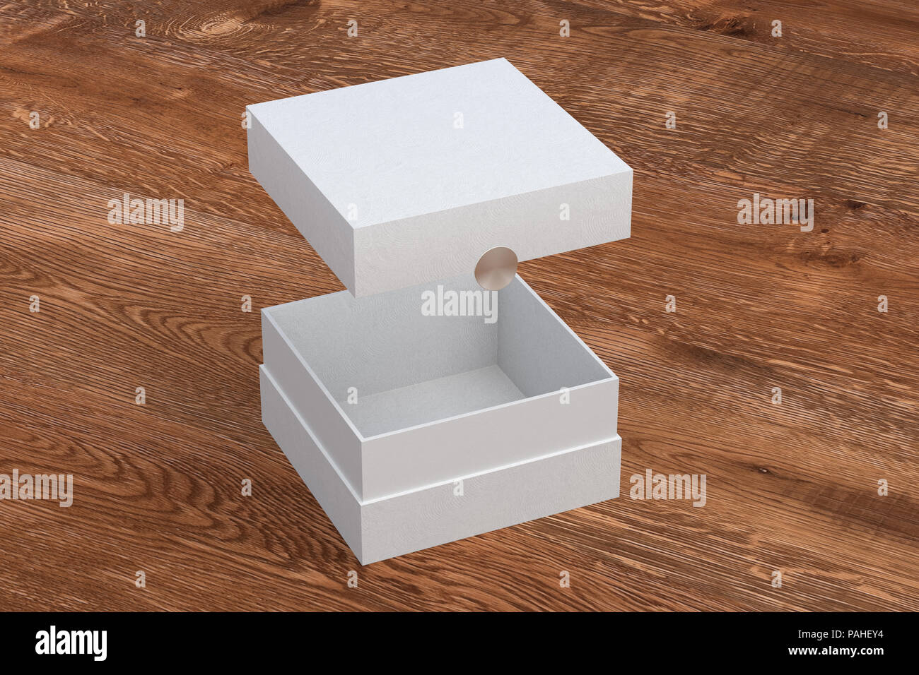 Opened white empty square box with cover flying above box on wooden ...