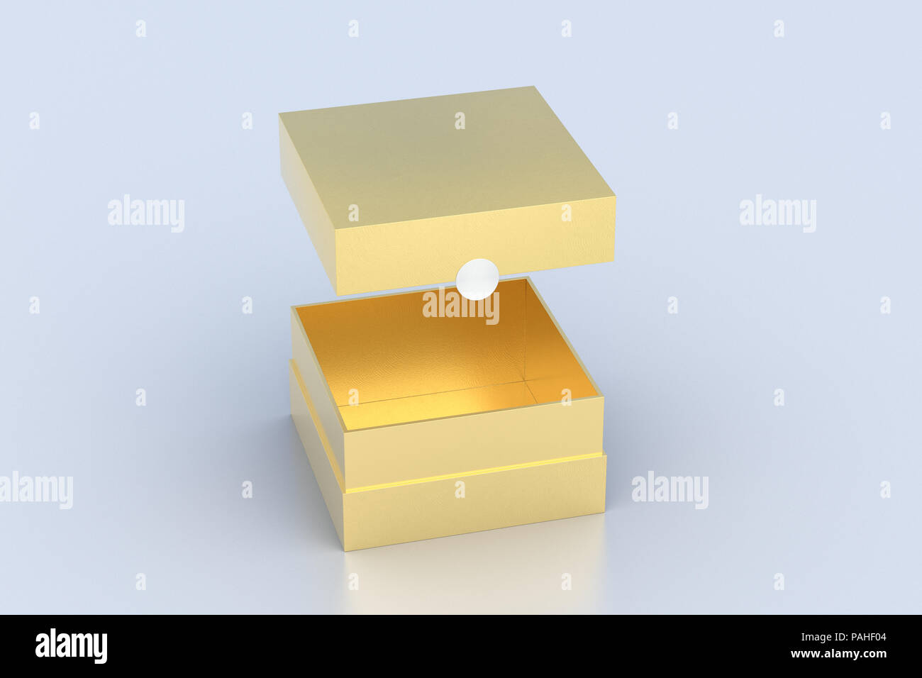 Opened gold empty square box with cover flying above box on white ...