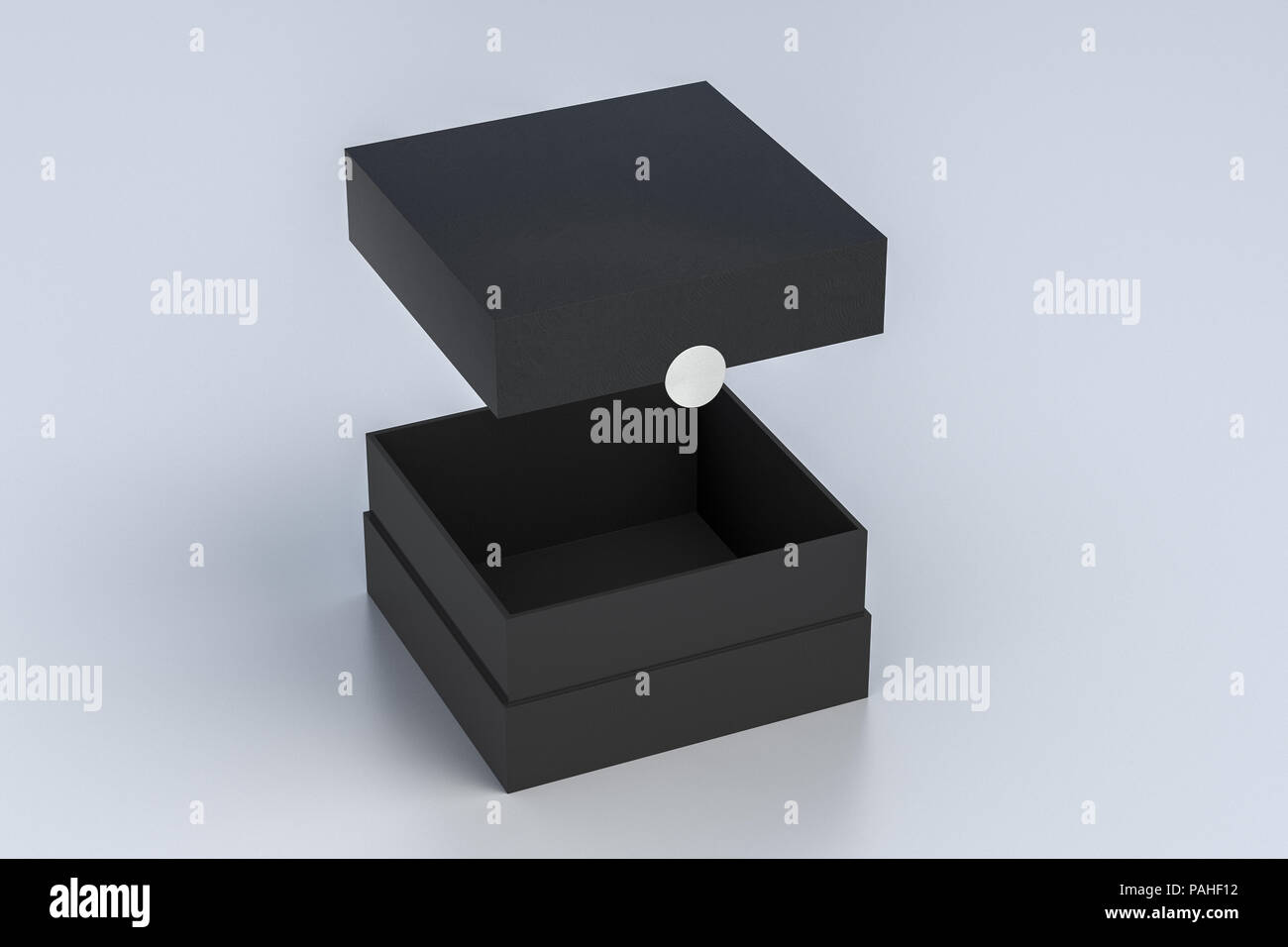 Opened black empty square box with cover flying above box on white ...
