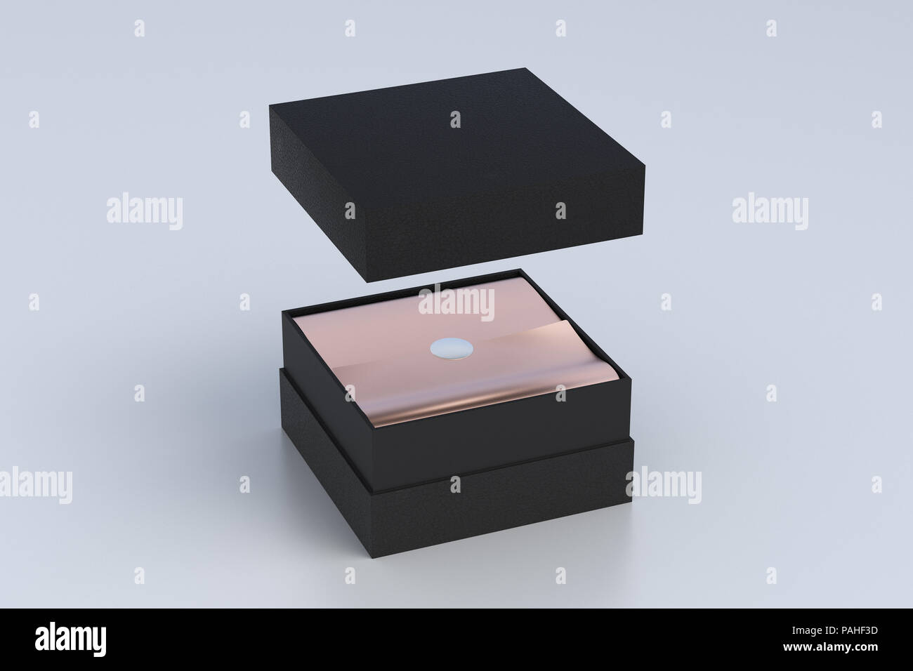 Opened black square box with copper wrapping paper inside box and cover ...