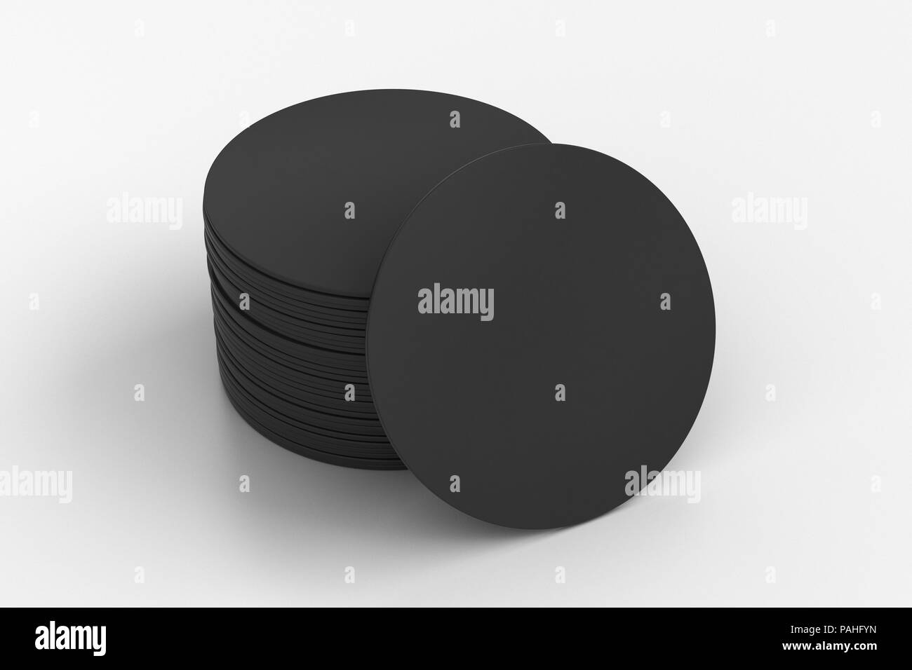 Black round beer coasters on white background with clipping path around ...