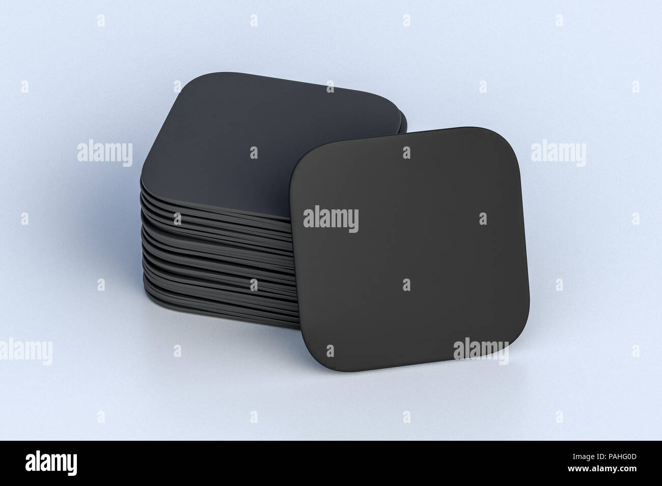 Black square beer coasters on white background with clipping path ...