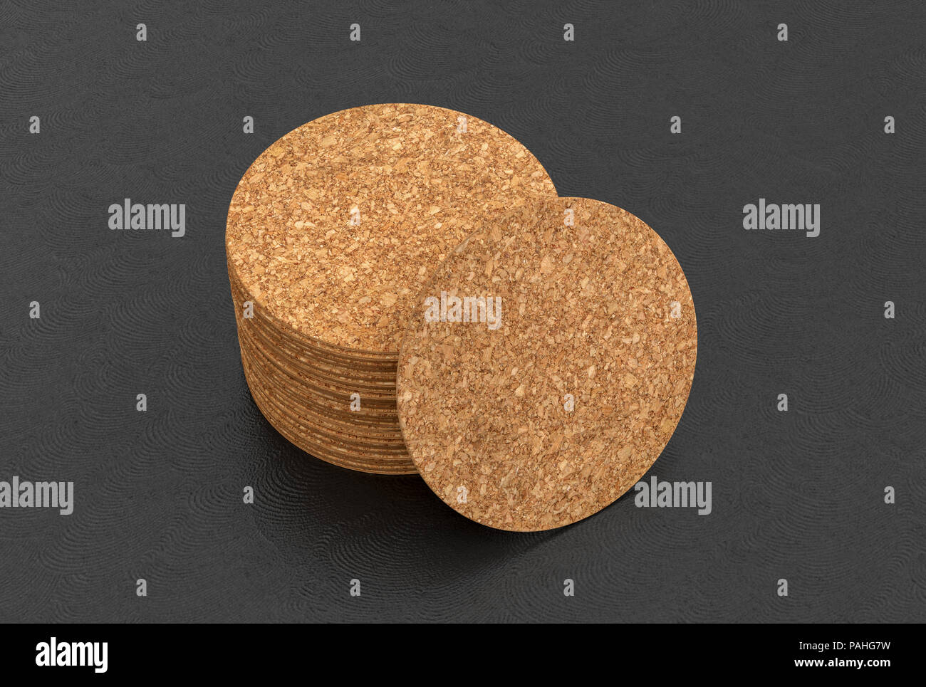 Cork round beer coasters on black background with clipping path around ...