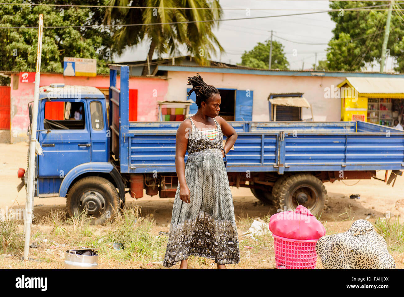 ACCRA, GHANA - MARCH 2, 2012: Unidentified Ghanaian woman stays in ...