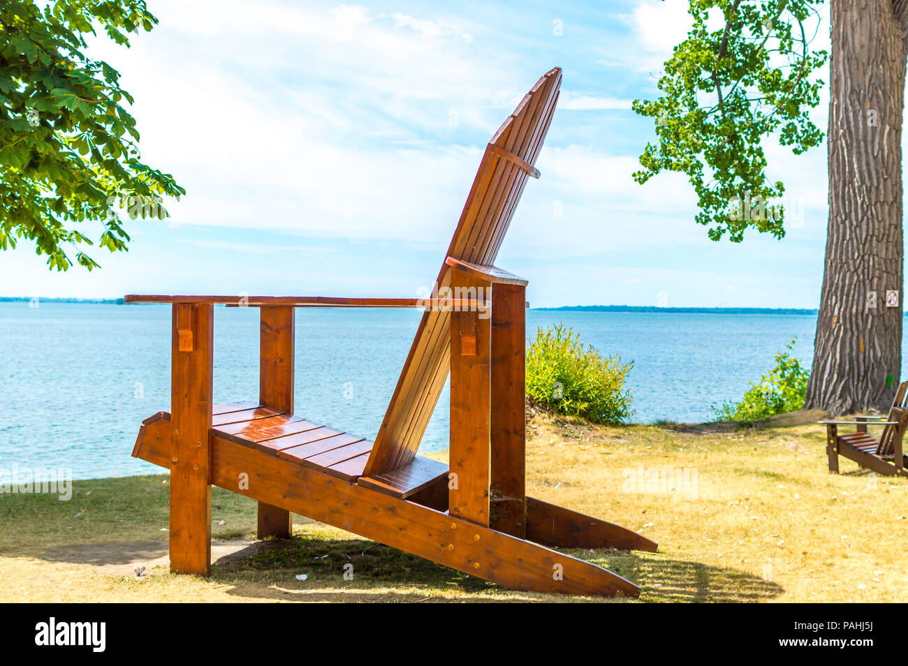 Large wooden chair in Quebec, Canada Stock Photo - Alamy
