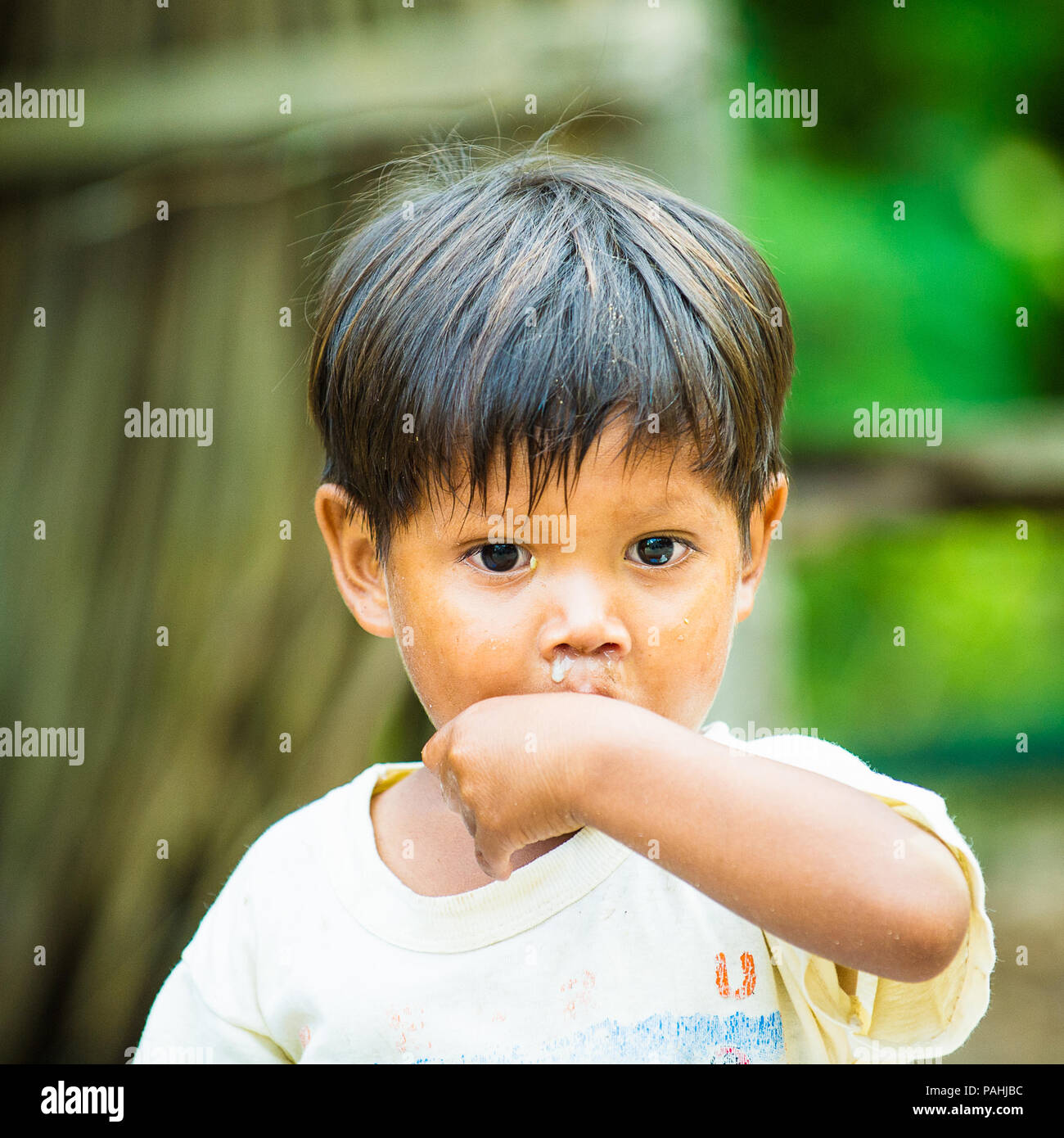 AMAZONIA, PERU - NOV 10, 2010: Unidentified Amazonian indigenous boy ...