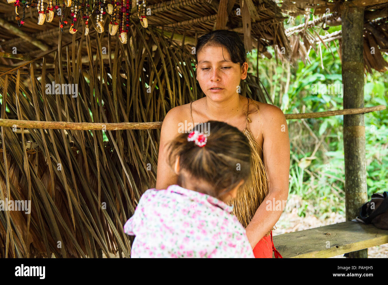 AMAZONIA, PERU - NOV 10, 2010: Unidentified Amazonian indigenous woman ...