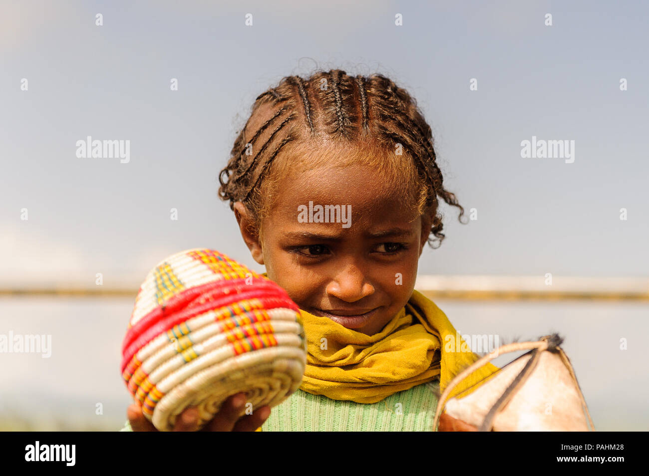 OMO, ETHIOPIA - SEPTEMBER 19, 2011: Unidentified Ethiopian shy ...