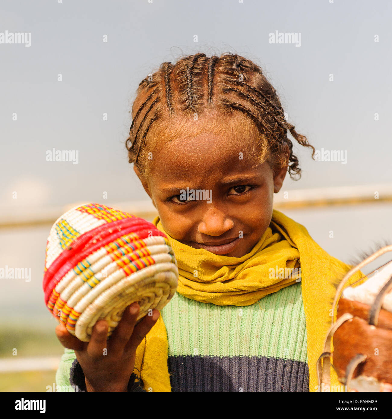 OMO, ETHIOPIA - SEPTEMBER 19, 2011: Unidentified Ethiopian shy ...