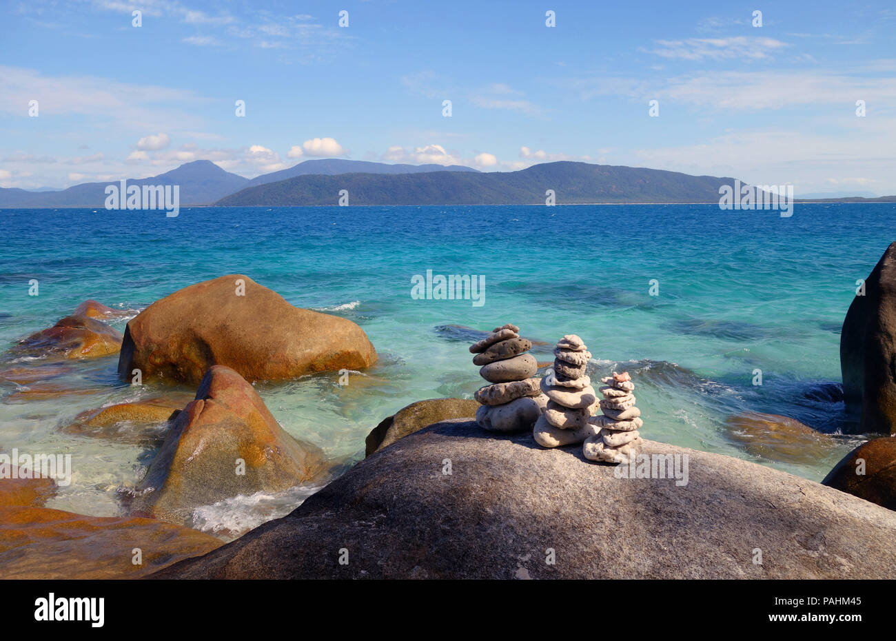 Rock stacks on beach boulders, Fitzroy Island, Great Barrier Reef ...