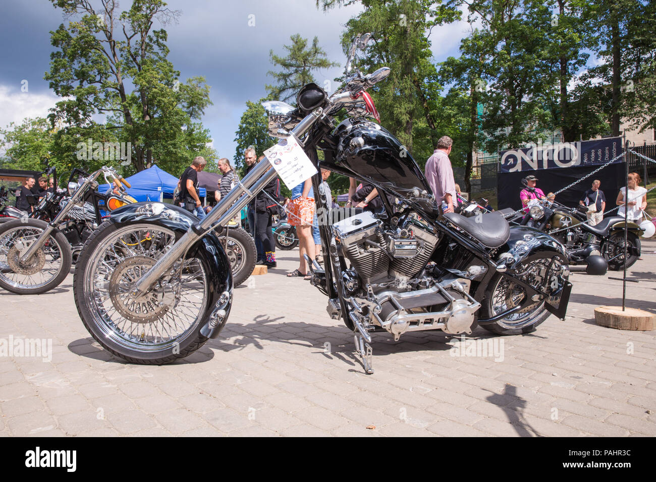 City Cesis, Latvia. Motorcycle show, exhibition at city park. Peoples ...