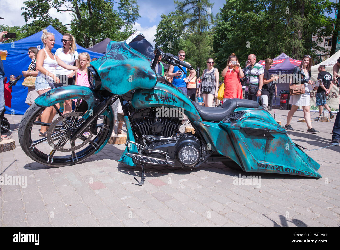 City Cesis, Latvia. Motorcycle show, exhibition at city park. Peoples ...