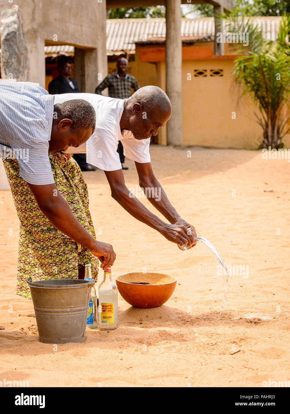 LOME, TOGO - MAR 9, 2013: Unidentified Togolese men in traditional ...