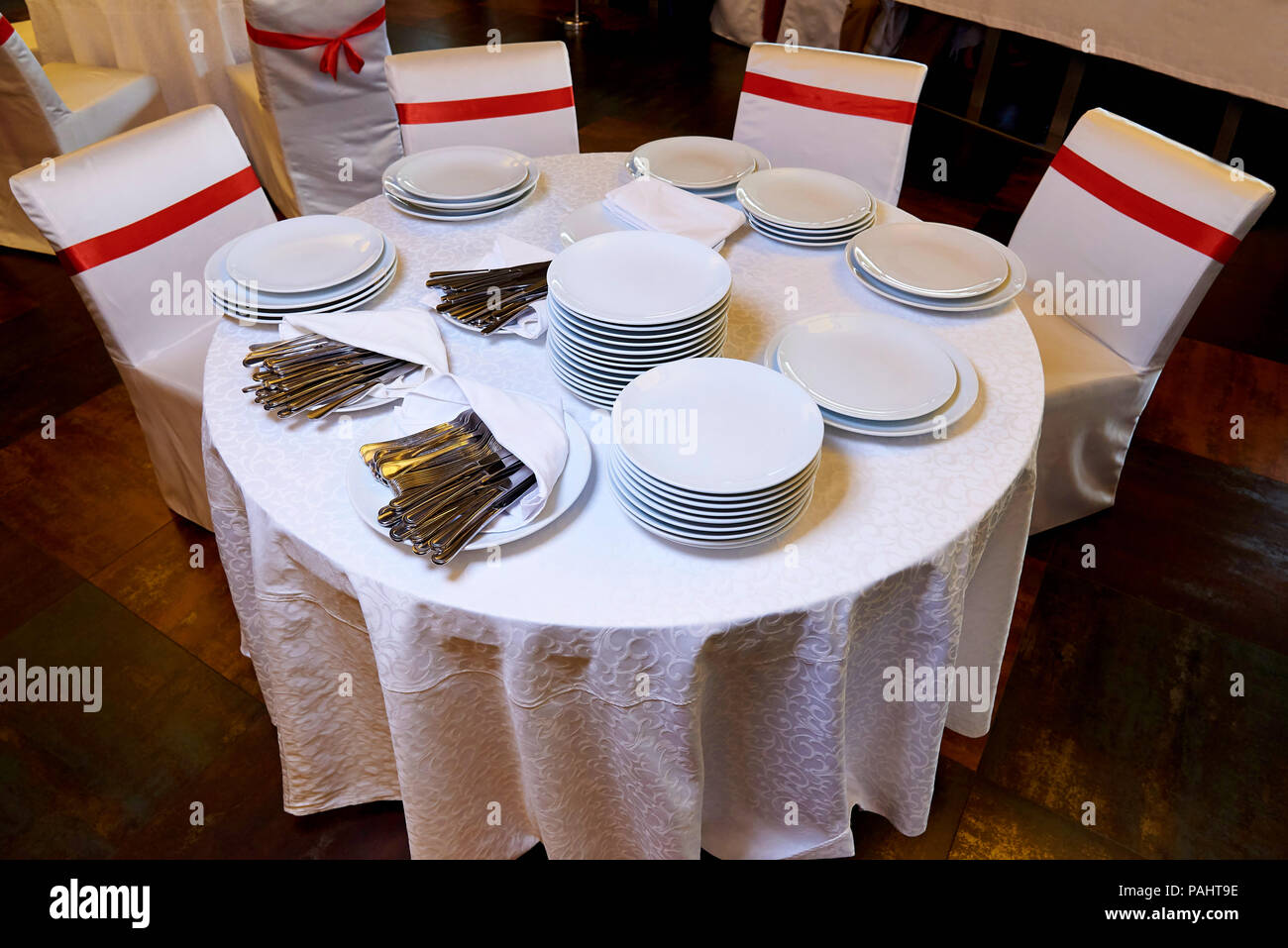 A set of plates and cutlery for the buffet Stock Photo - Alamy