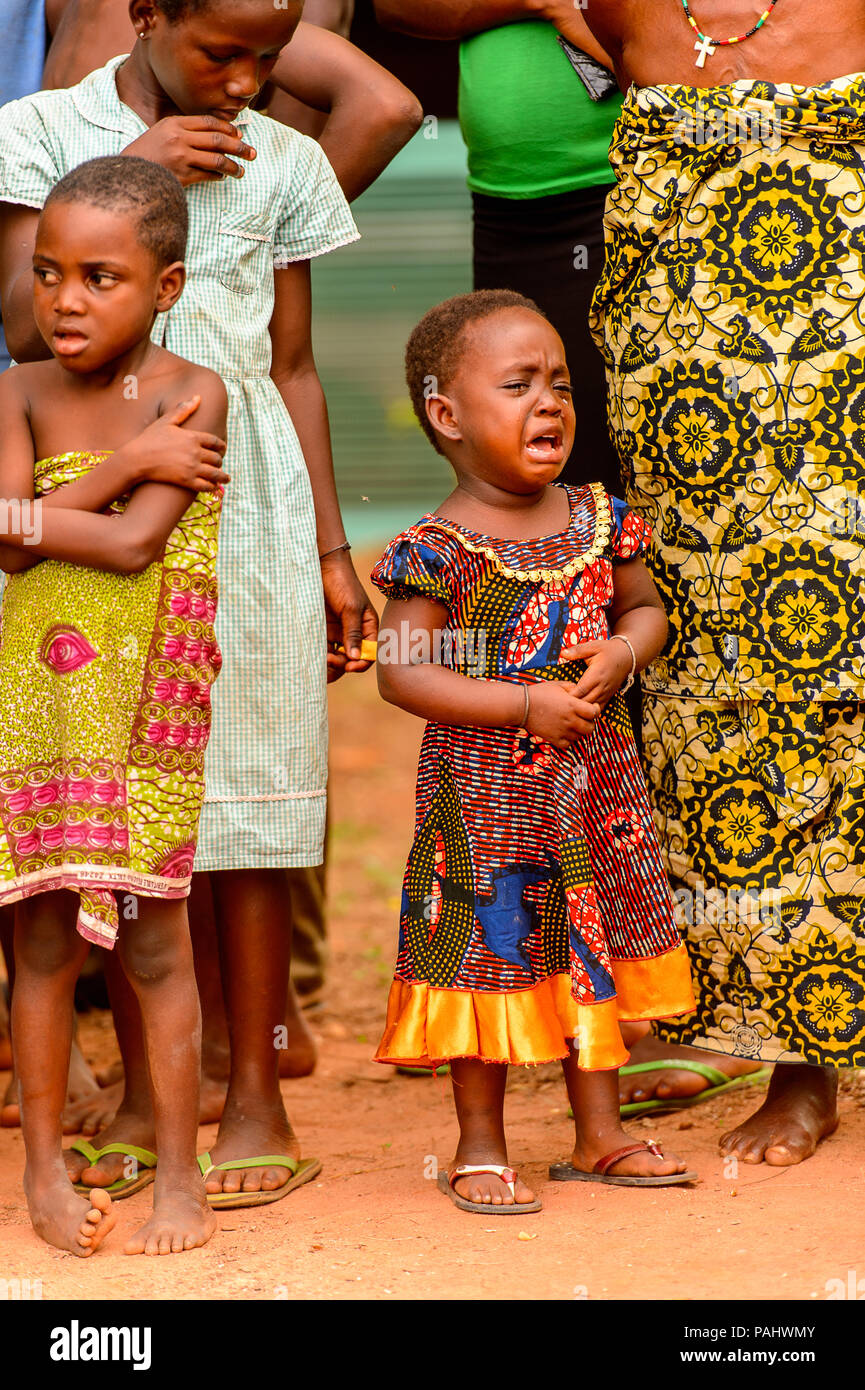 KARA, TOGO - MAR 9, 2013: Unidentified Togolese little girl in a ...