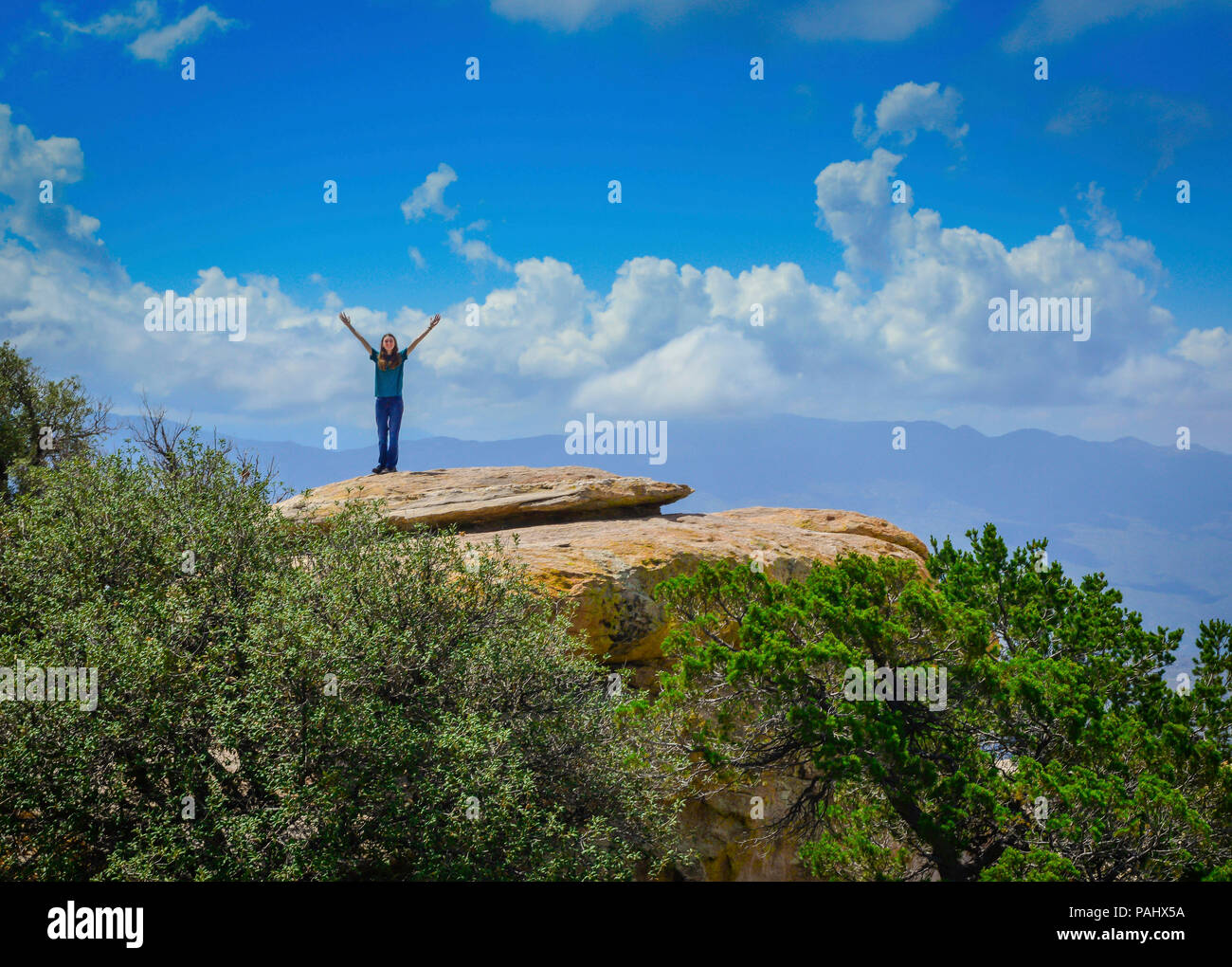 Hands above her head hi-res stock photography and images - Alamy