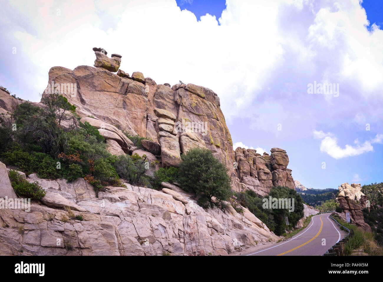 A view of Mt. Lemon highway below land formations of ancient grantite ...
