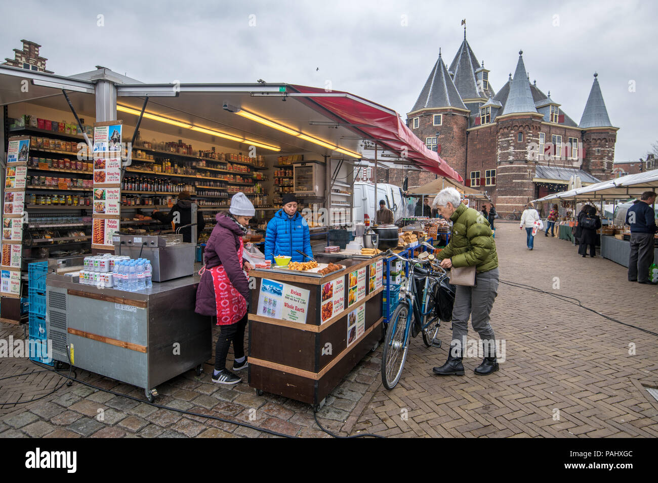 Woman mans booth at an outdoor market in Amsterdam, Netherlands Stock ...