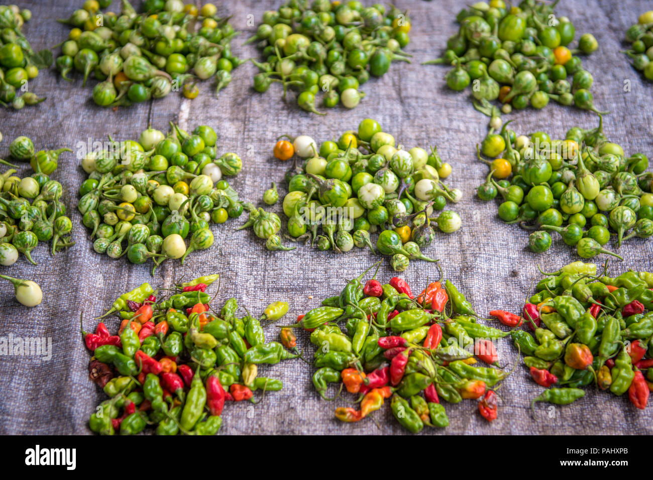 Produce is neatly arranged in rows in Ganta, Liberia Stock Photo - Alamy