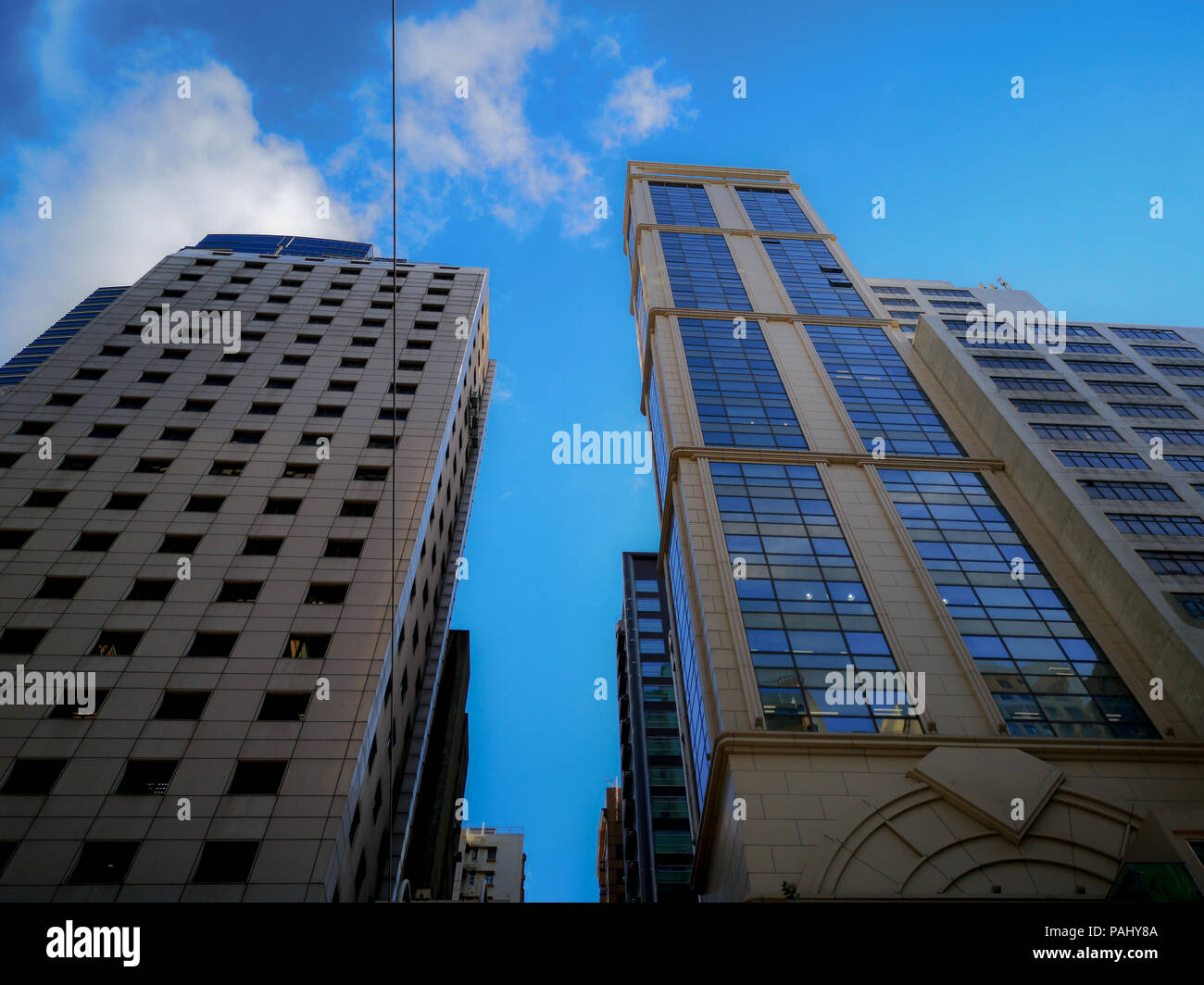 Bottom up view of Modern office building in Hong Kong Stock Photo - Alamy