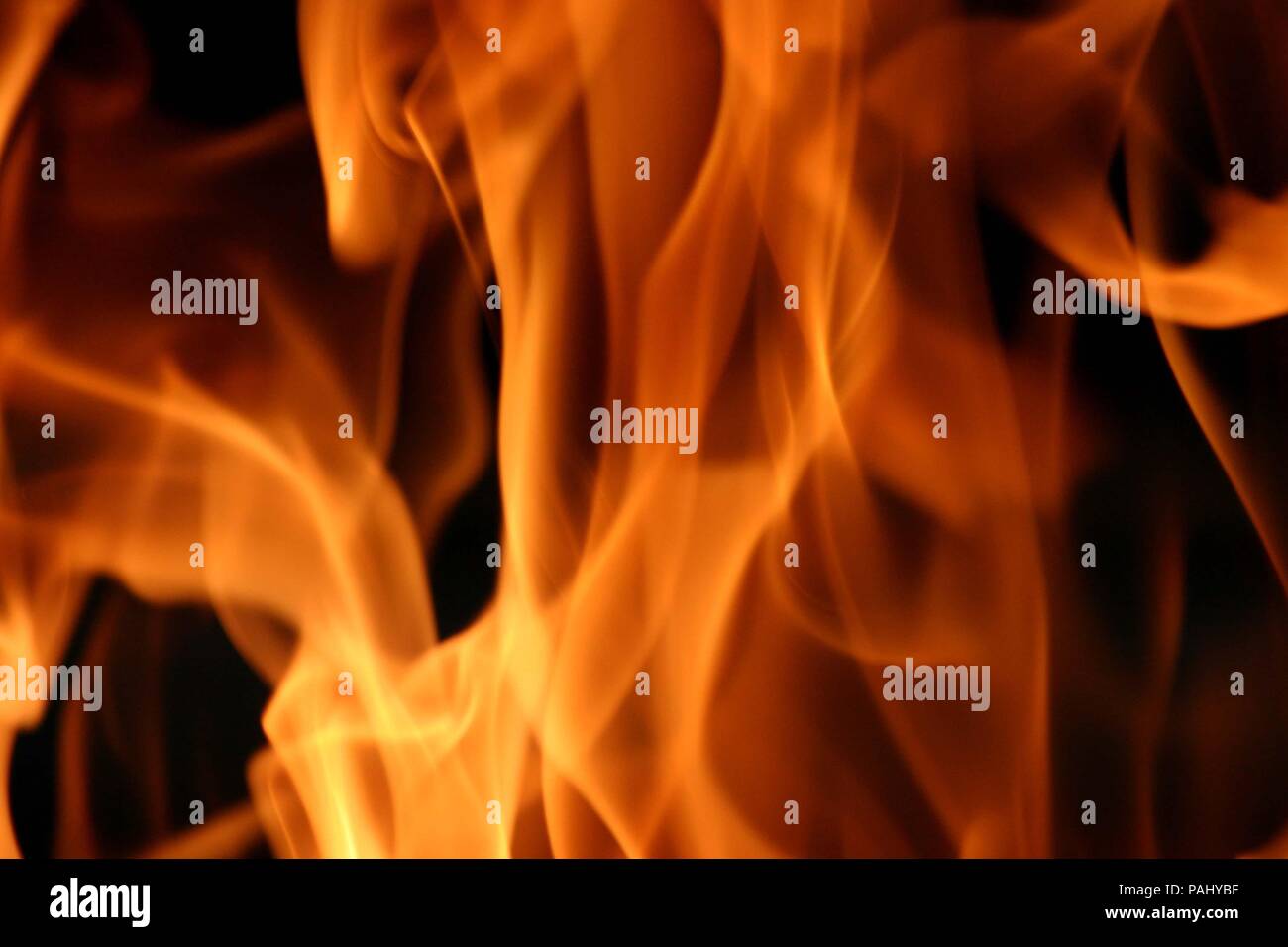 Closeup of flames in a fire pit Stock Photo - Alamy