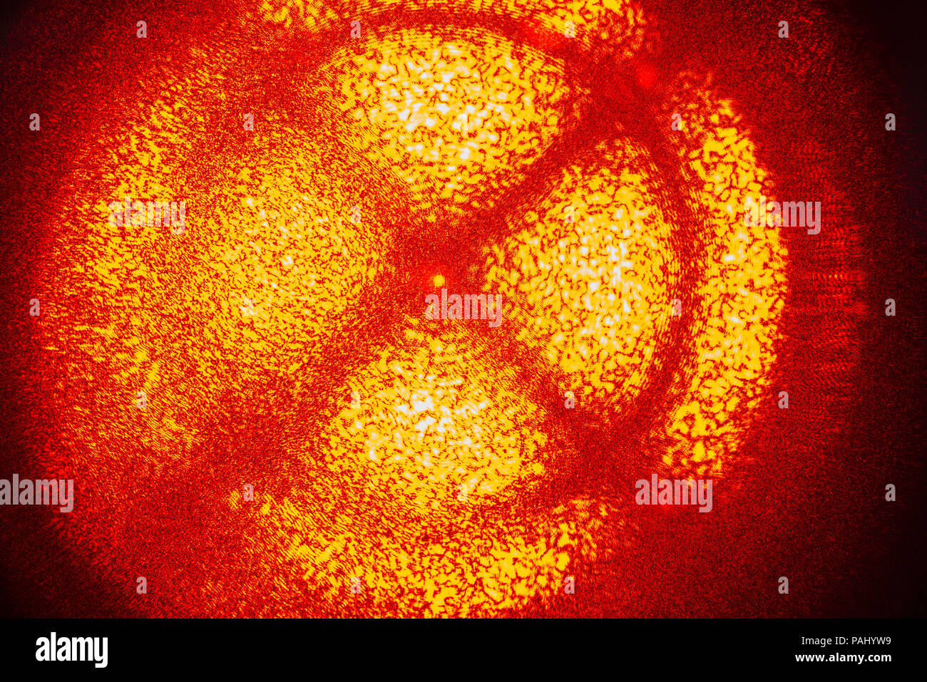red laser cross birefringence pattern of nonlinear optical crystal ...
