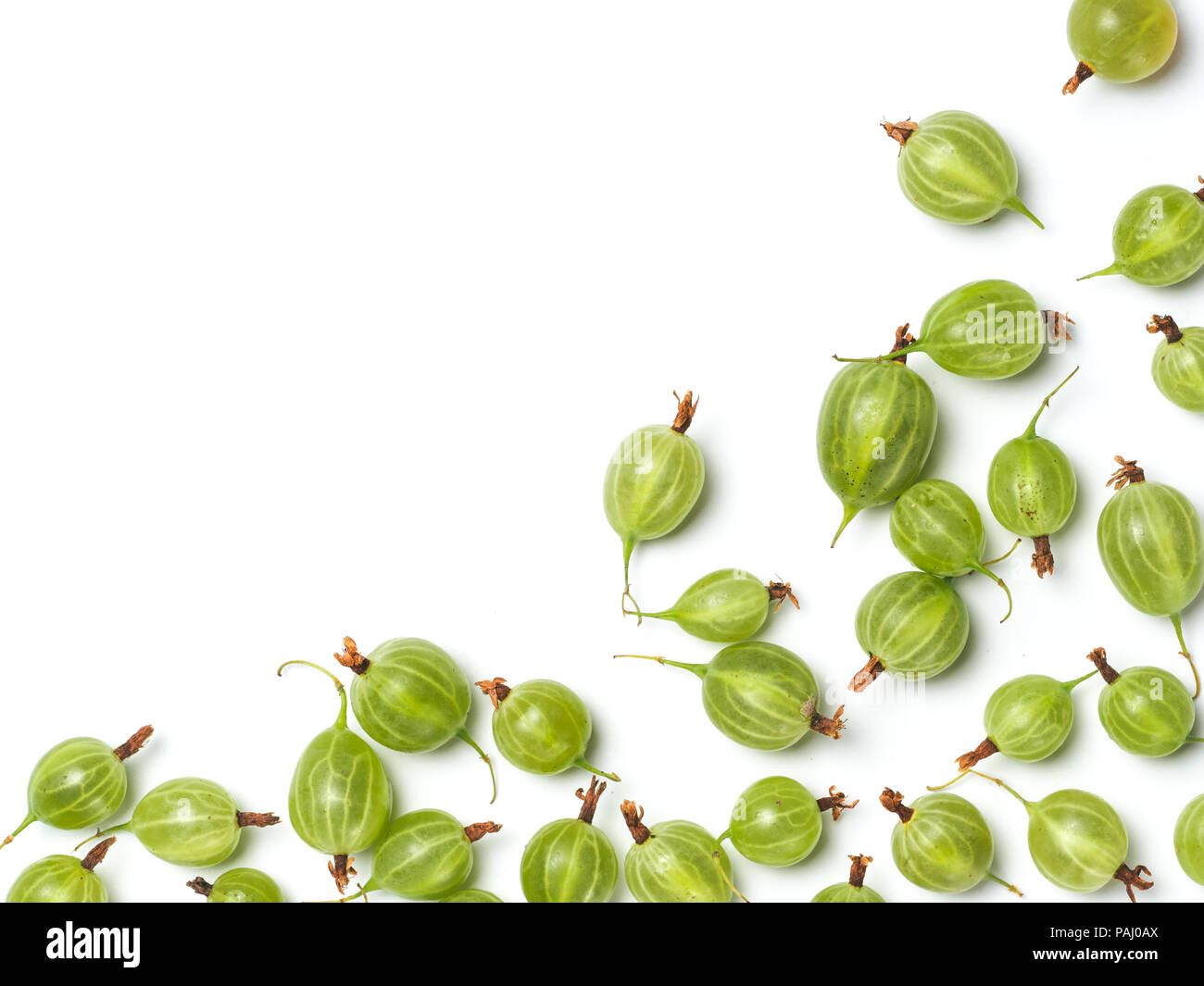 Heap of ripe green gooseberry berries on white background. Creative ...