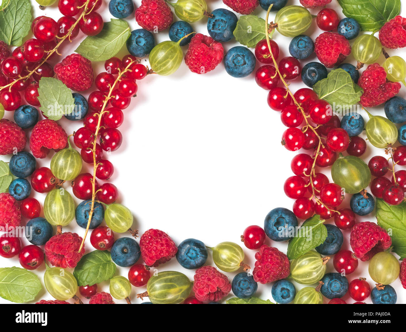 Various fresh summer berries background with copy space for text in ...