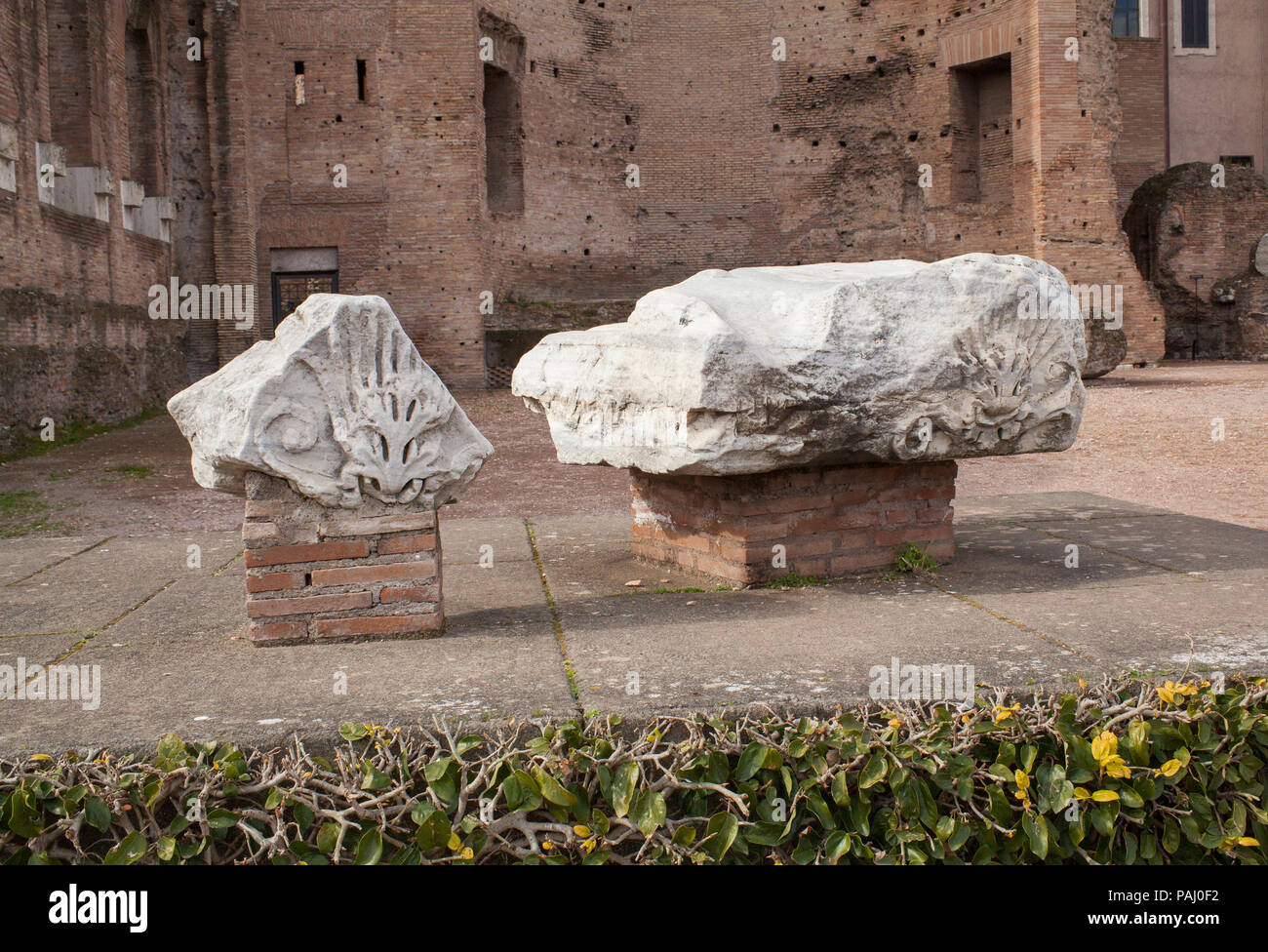 old marble ruins of columns in Rome city, Italy Stock Photo - Alamy