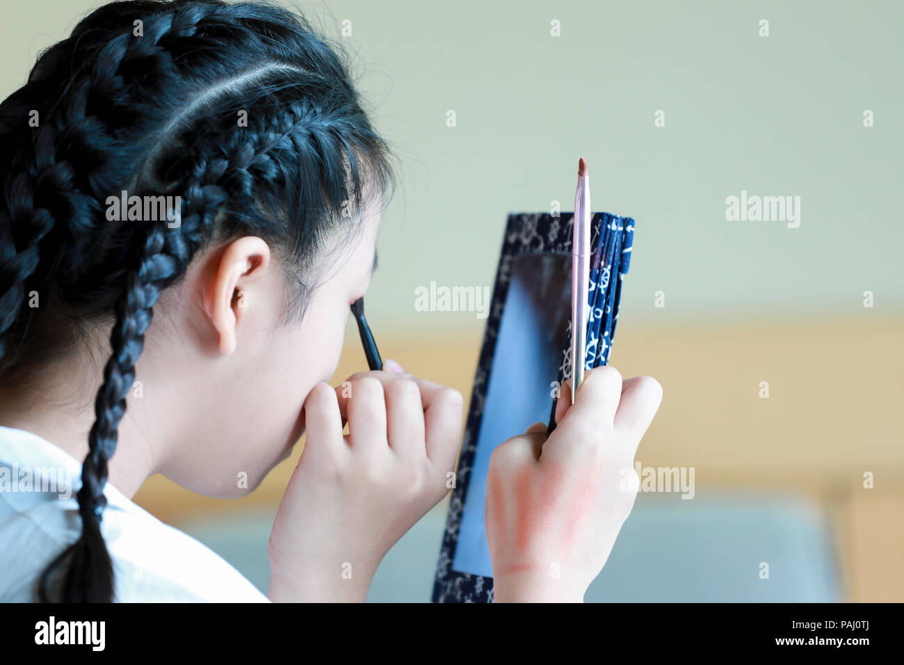 young cute girl makeup her face Stock Photo - Alamy