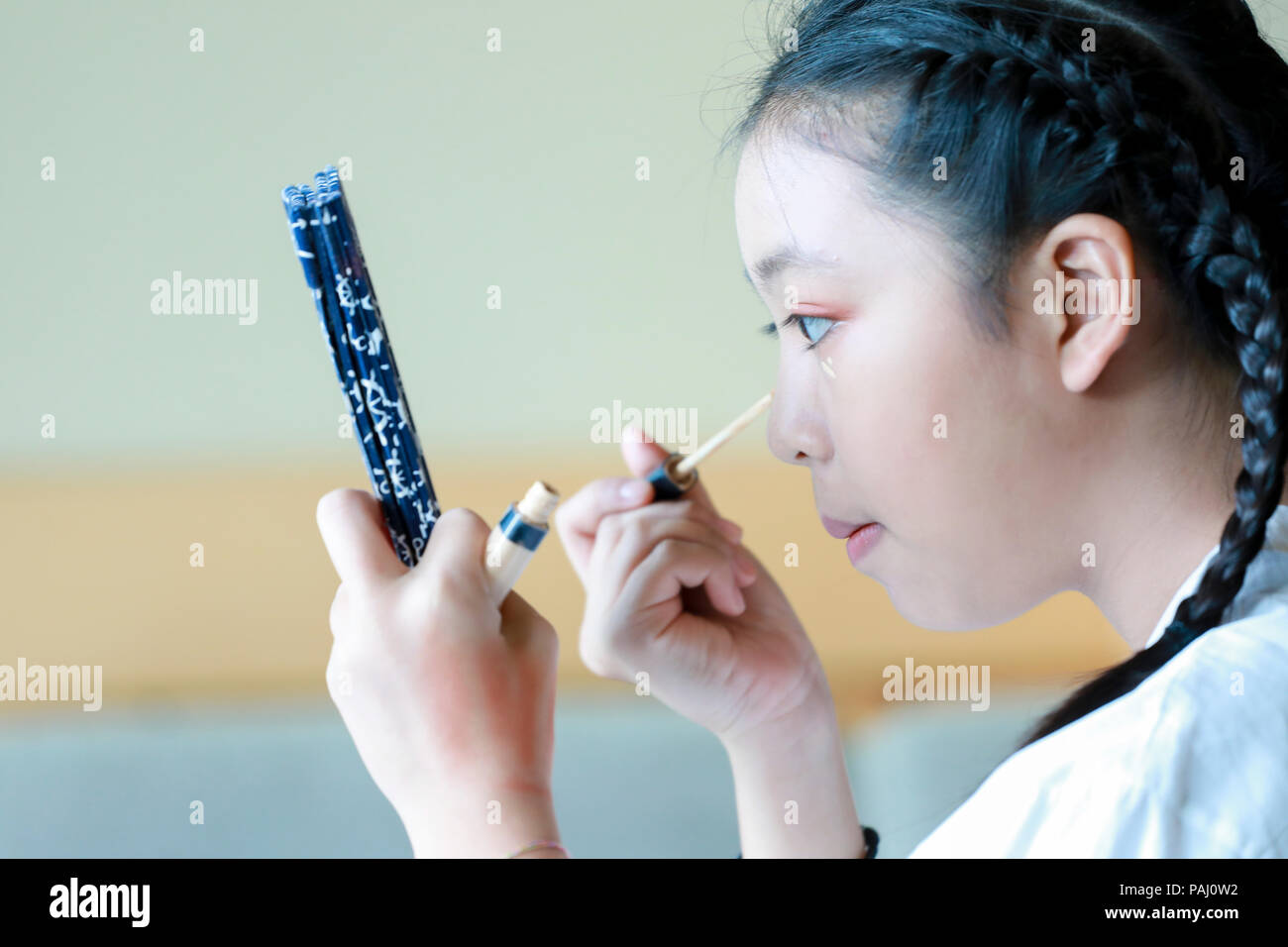 young cute girl makeup her face Stock Photo - Alamy