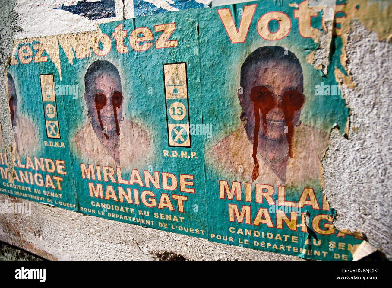 Defaced Political propaganda. 22 February 2006 - Mirlande Manigat, a ...