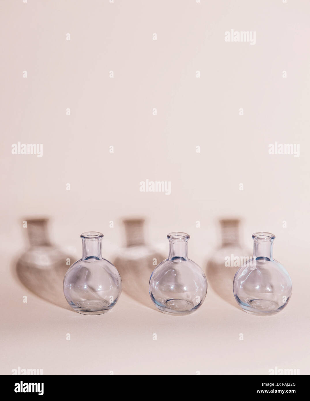 Colorful empty vases against a trendy background. Creative minimal ...