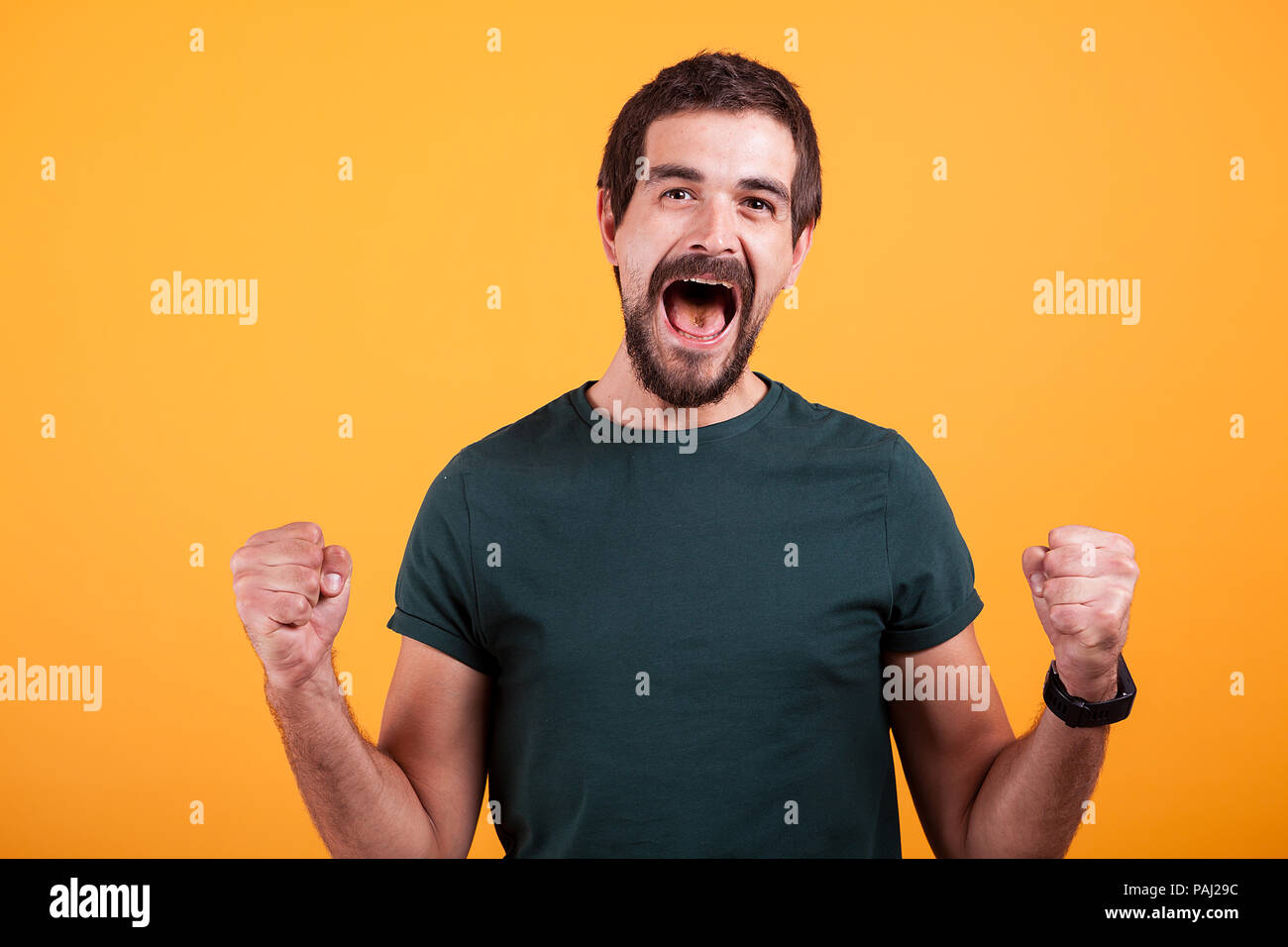 Joyful screaming excited man with his mouth open from emotions on ...