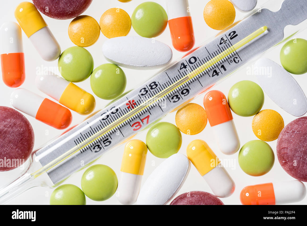 clinical thermometer and tablets, disease and medication, Pills Stock ...