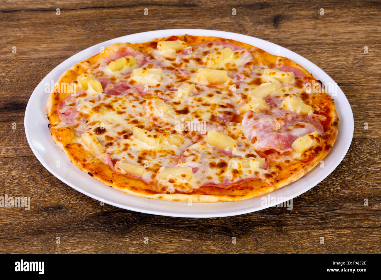 Pizza with ham and cheese Stock Photo - Alamy
