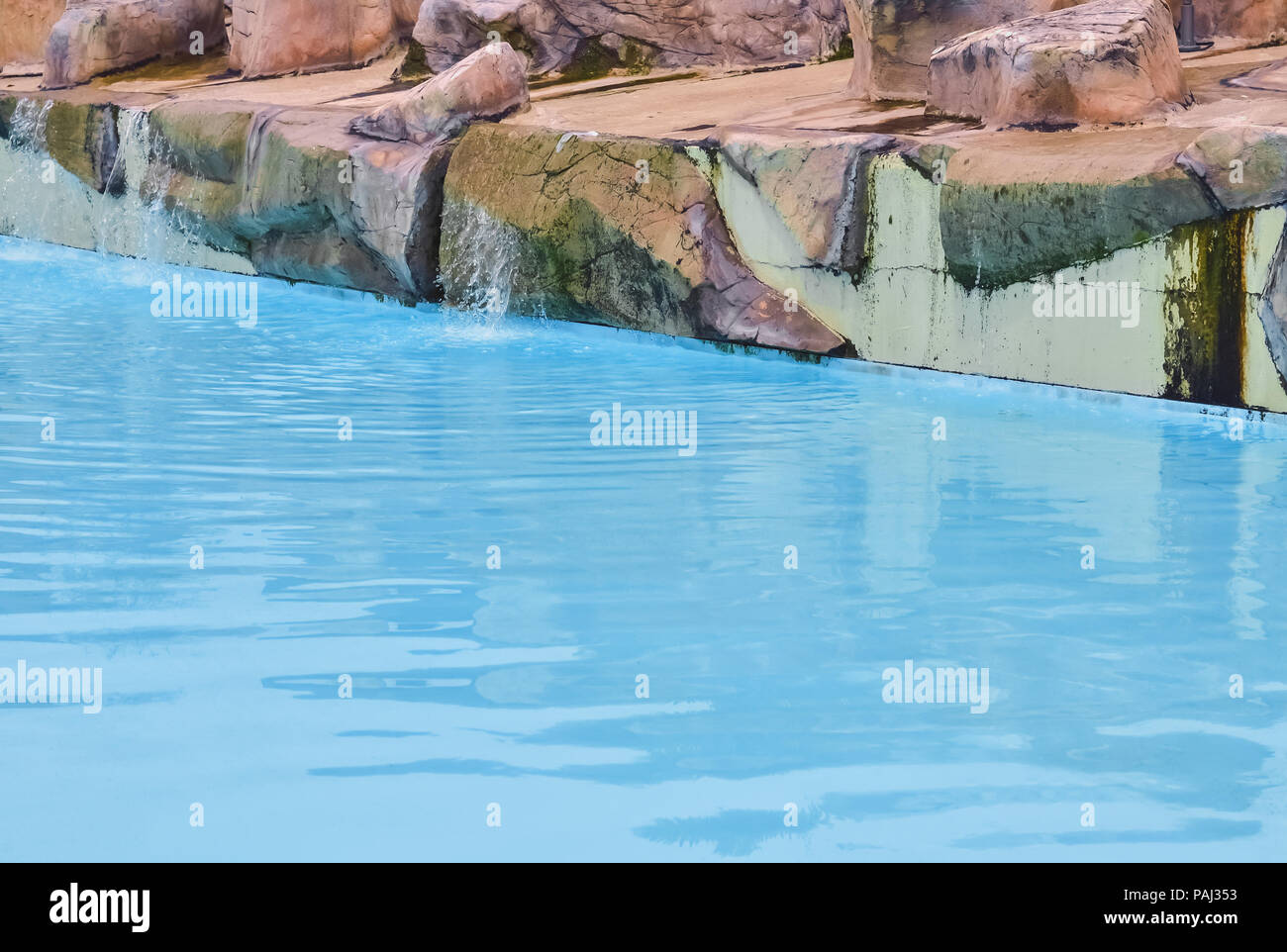 Detail of a luxury swimming pool with turquoise water Stock Photo - Alamy