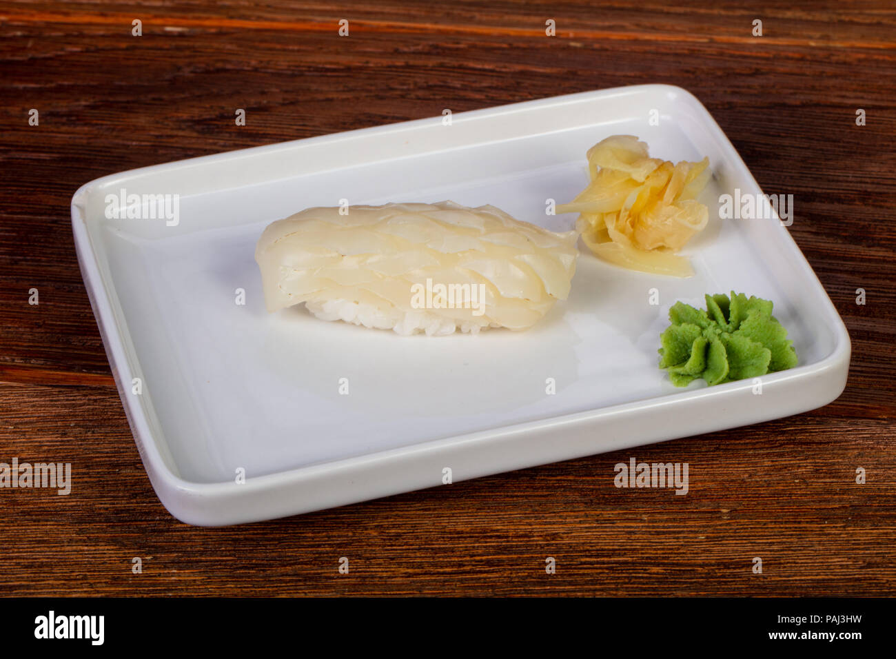 Japanese cold sushi with squid Stock Photo - Alamy