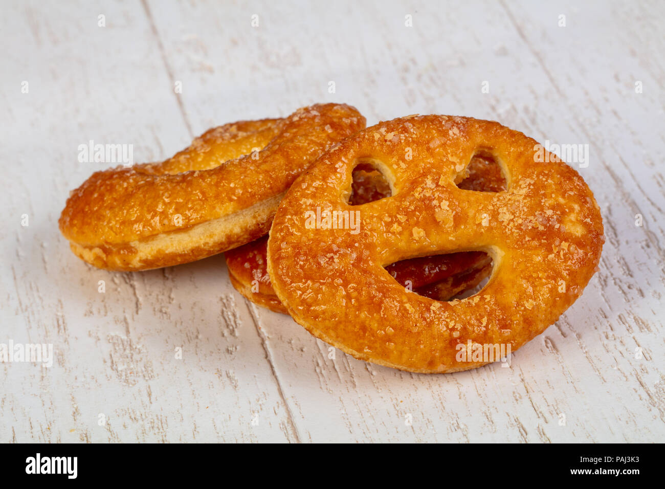 Tasty baked puff pastry pretzels Stock Photo - Alamy
