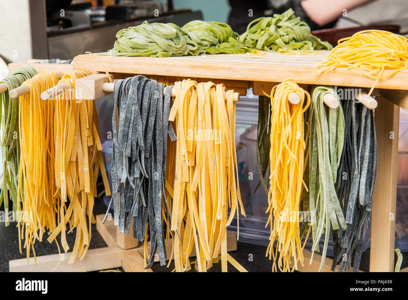Close up Different kinds of handmade pasta on the showcase of cafe ...