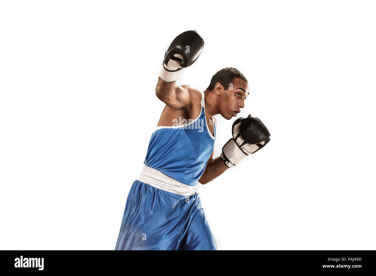 Sporty man during boxing exercise. Photo of boxer on white background ...