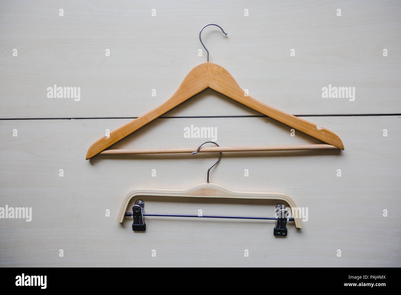 coat hanger on the table against white background Stock Photo - Alamy