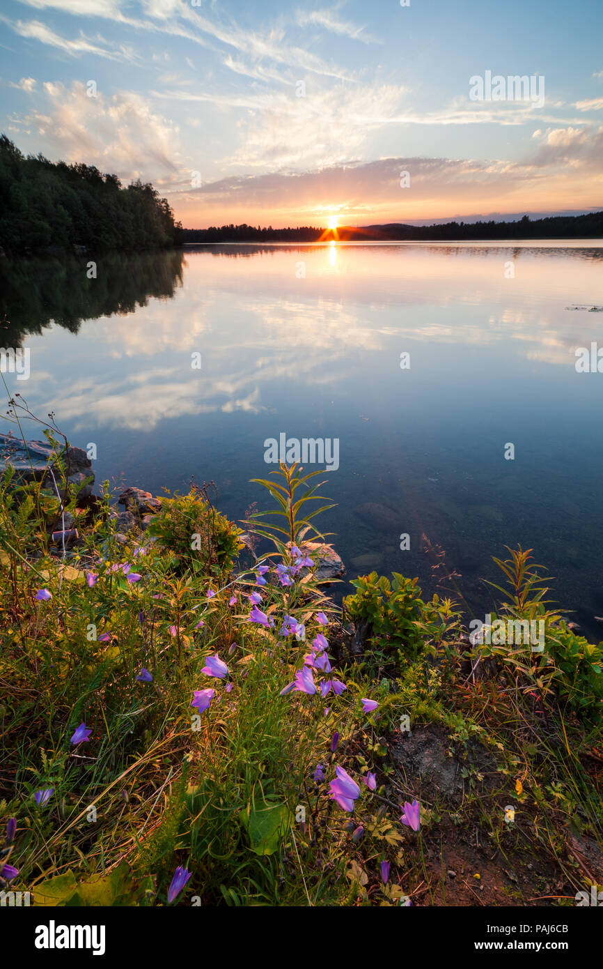 Sunset at lakeside Stock Photo - Alamy