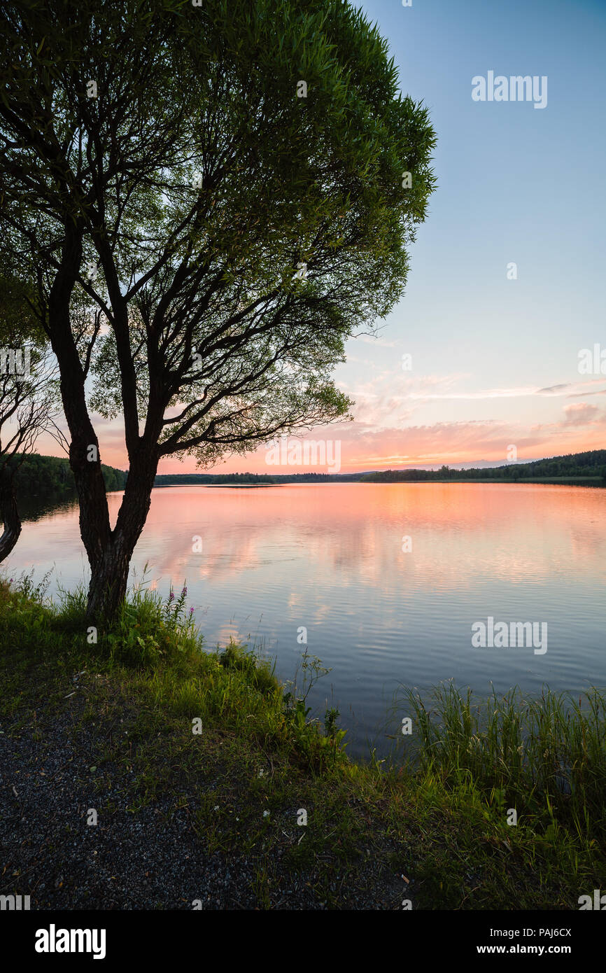 Sunset at lakeside Stock Photo - Alamy