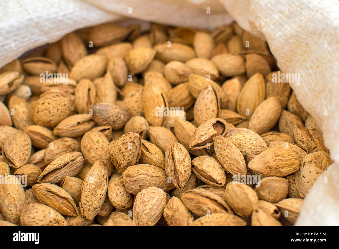 Almonds in the shell Stock Photo - Alamy