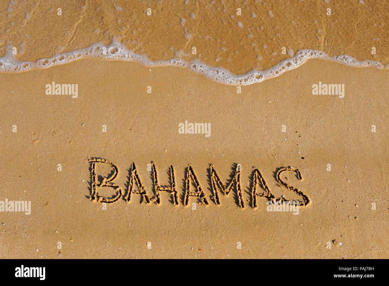 Bahamas word on sandy summer beach, travel background Stock Photo - Alamy