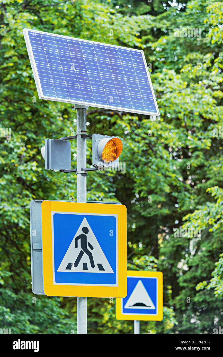 Solar cells and traffic light by the crossroad Stock Photo - Alamy